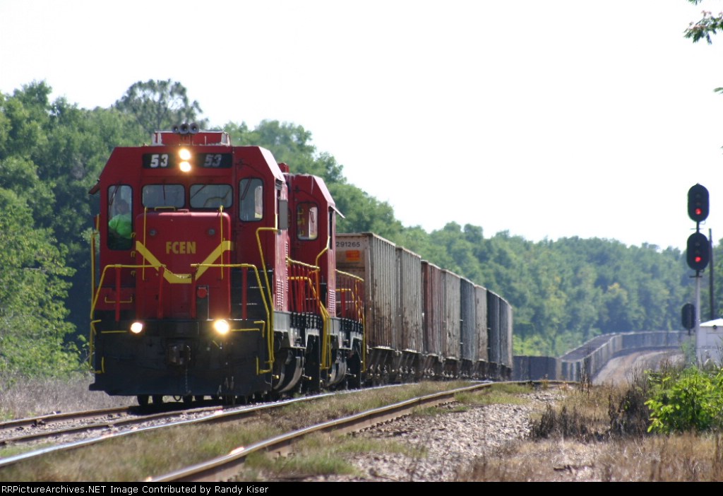 FCEN 53 backs to CSX interchange to deliver empty rock cars